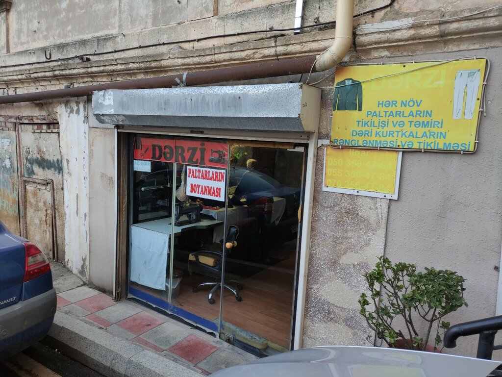 Kıyafet tamiri Dərzi, Bakü, foto
