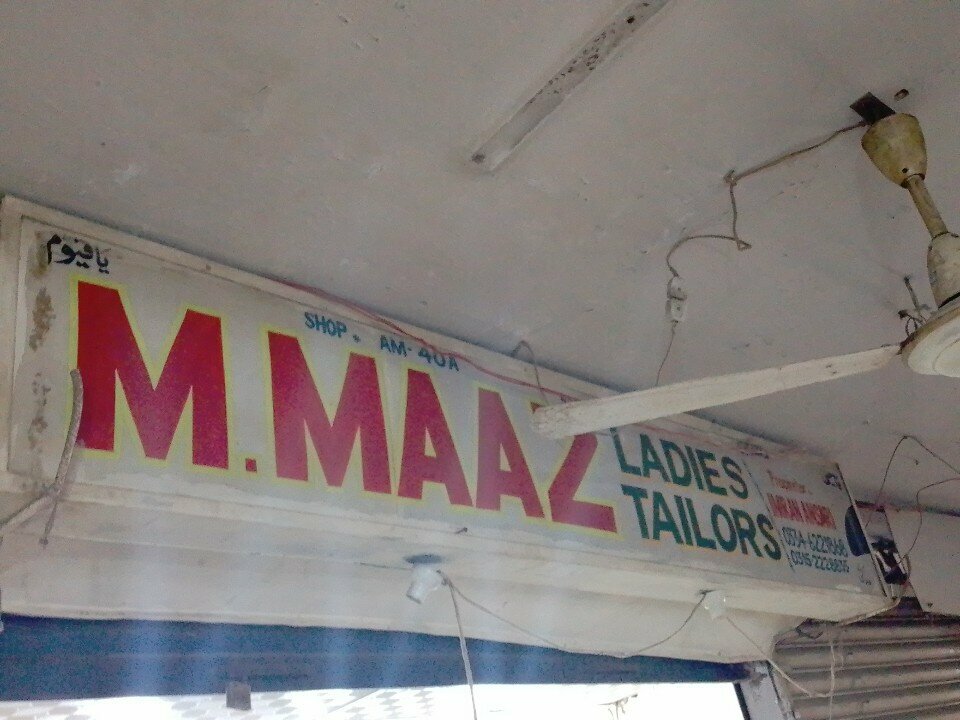 Kıyafet tamiri M. maaz, Karaçi, foto