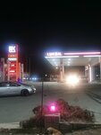 Lukoil (Çingiz Mustafayev küçəsi No:1A, Qobu qəsəbəsi), benzin istasyonu  Bakü'den