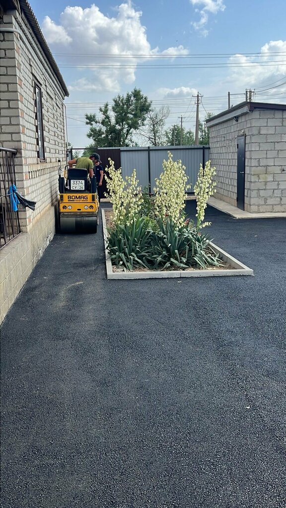 Yol yapım ekipmanları Мастерок асфальтирование дорог, Stavropolski krayı, foto