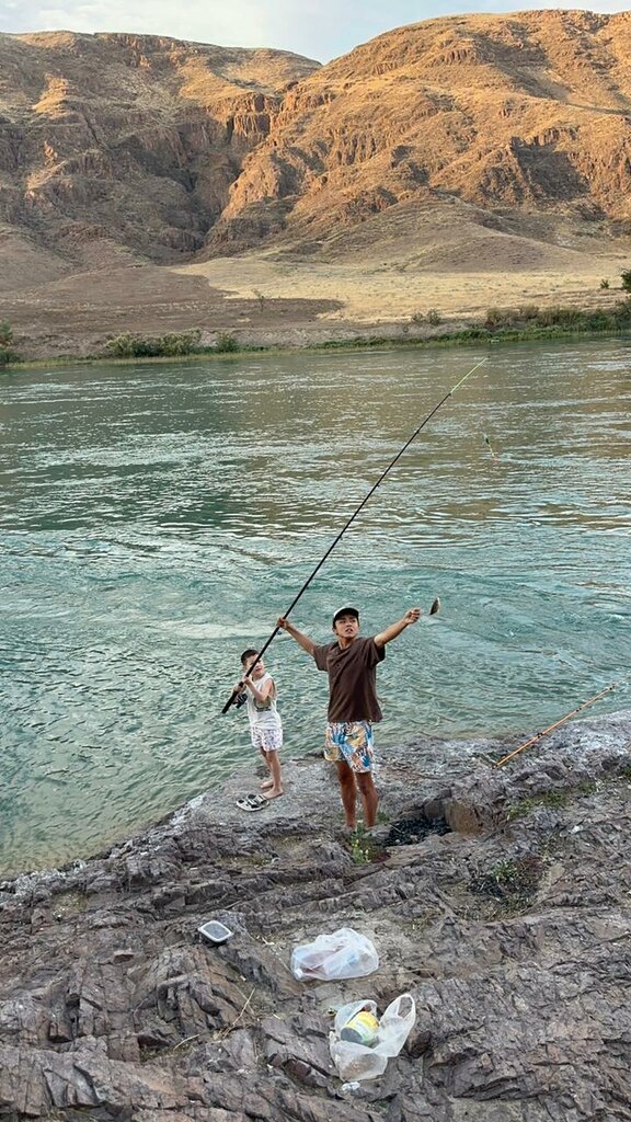 Avcılar ve balıkçılar Ribin good, Almatı eyaleti, foto