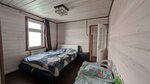 KuzminHouse (Nikolayevskaya ulitsa No:9А, derevnya Beregovyye Moriny), otel  Novgorodskaya oblastından