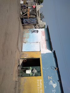 Dray’s Barbershop (Lusaka, John Laing), berberler  Lusaka'dan