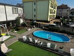 Paradise (улица Олега Колодяжного No:11, посёлок городского типа Новофёдоровка), otel  Kırım Cumhuriyeti'nden
