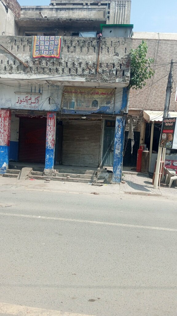 Otomobil servisi Akram leather house and refairing centre, Lahor, foto