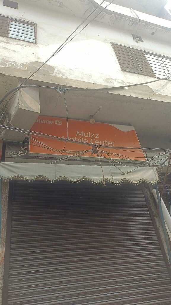 Cep telefonu ve aksesuarları satış mağazaları Moizz, Lahor, foto