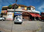 Yucra (Santa Cruz de la Sierra, Calle Rómulo Mercado), oto döşeme  Santa‑Krus'tan