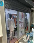 Sf Boutique (Abidjan, Treichville, Rue Du Grand Marche), üniforma üreticileri  Abican'dan