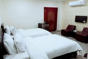 Hotel Crown Inn Multan (Province of Punjab, City of Multan, Chungi No. 9 Flyover), otel  Multan'dan