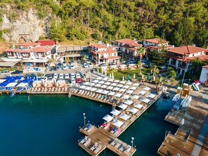 Maden İskelesi (Muğla, Ula, Demirtaş Mah., İkiz Kuyu Cad.), otel  Ula'dan