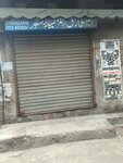 M Tariq and son's leader store (Province of Punjab, Lahore, Walled City of Lahore, Hira Mandi, Nicha Chait Ram Road), ayakkabı tamiri  Lahor'dan
