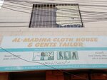 Al Madina (Province of Sindh, Karachi, Row I Street), dış giyim mağazası  Karaçi'den