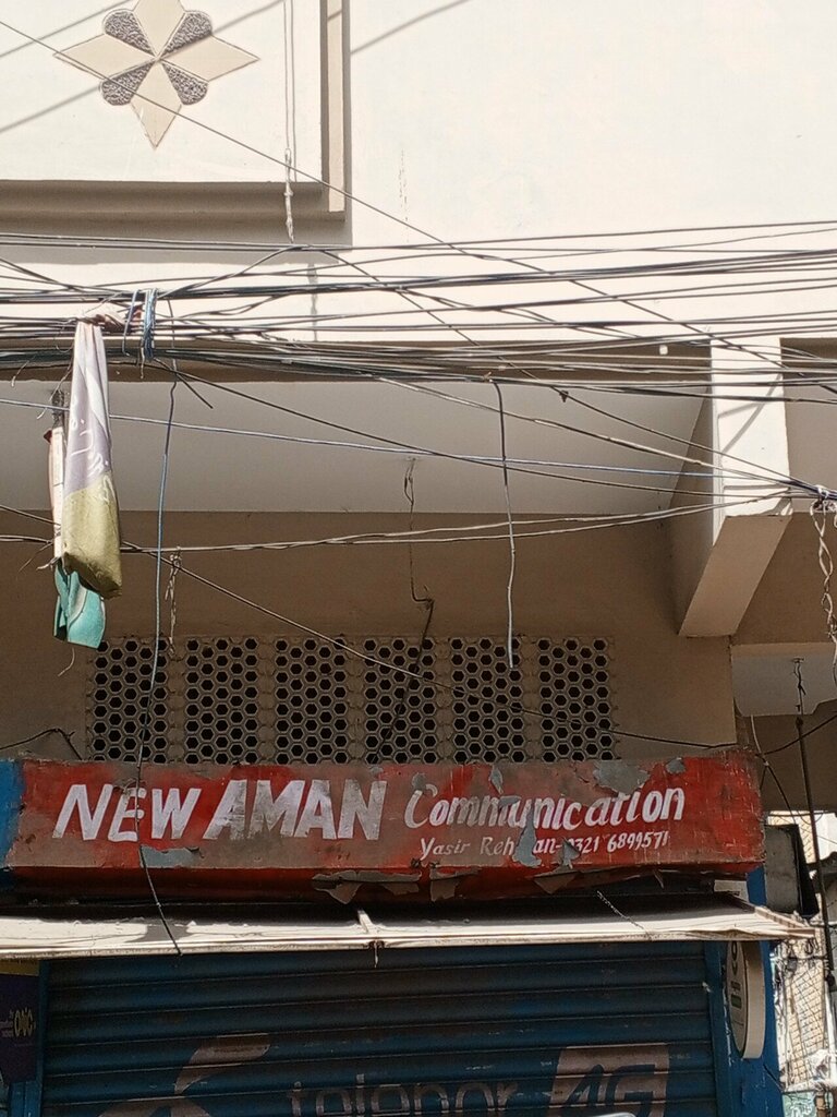 Cep telefonu ve aksesuarları satış mağazaları New aman communication, Karaçi, foto