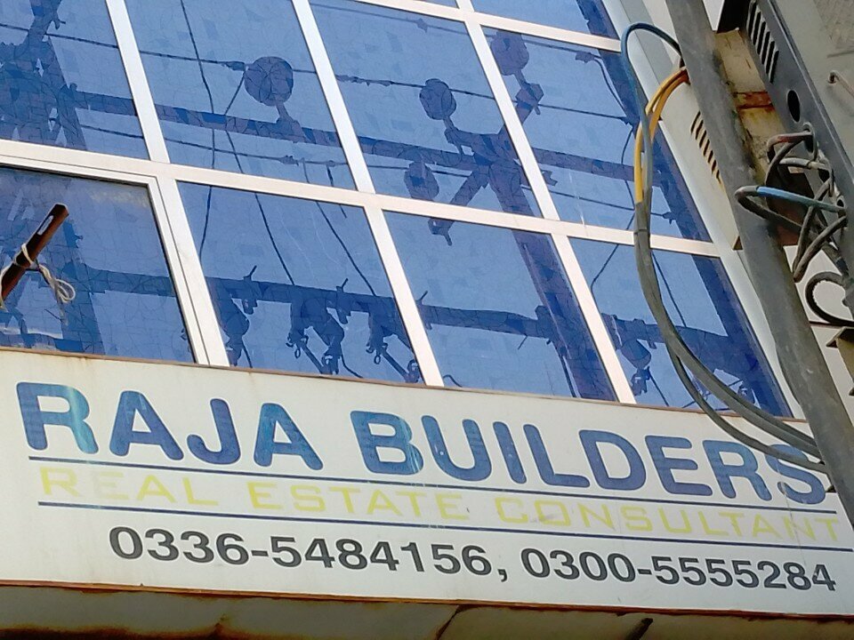 Emlak ofisi Raja builders, Karaçi, foto