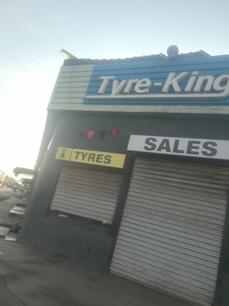 Jant ve lastikçiler Tire-King, Lusaka, foto
