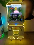 Prize Out (Mira Avenue No:9Б), oyun makinesi  Omsk'tan