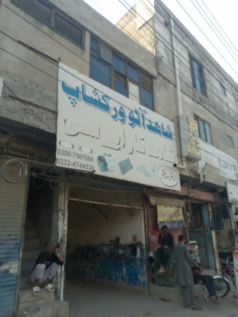 Otomobil servisi Shahid auto workshop, Lahor, foto
