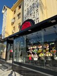 Mondeal (No:14, Paxtazor mitti-tumani), çiçekçiler  Karşı'dan