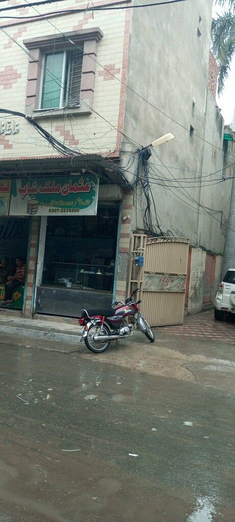 Bebek besleme merkezleri Usman milk shol, Lahor, foto