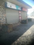 Sly24 (Lumumba Road No:17143), giyim mağazası  Lusaka'dan