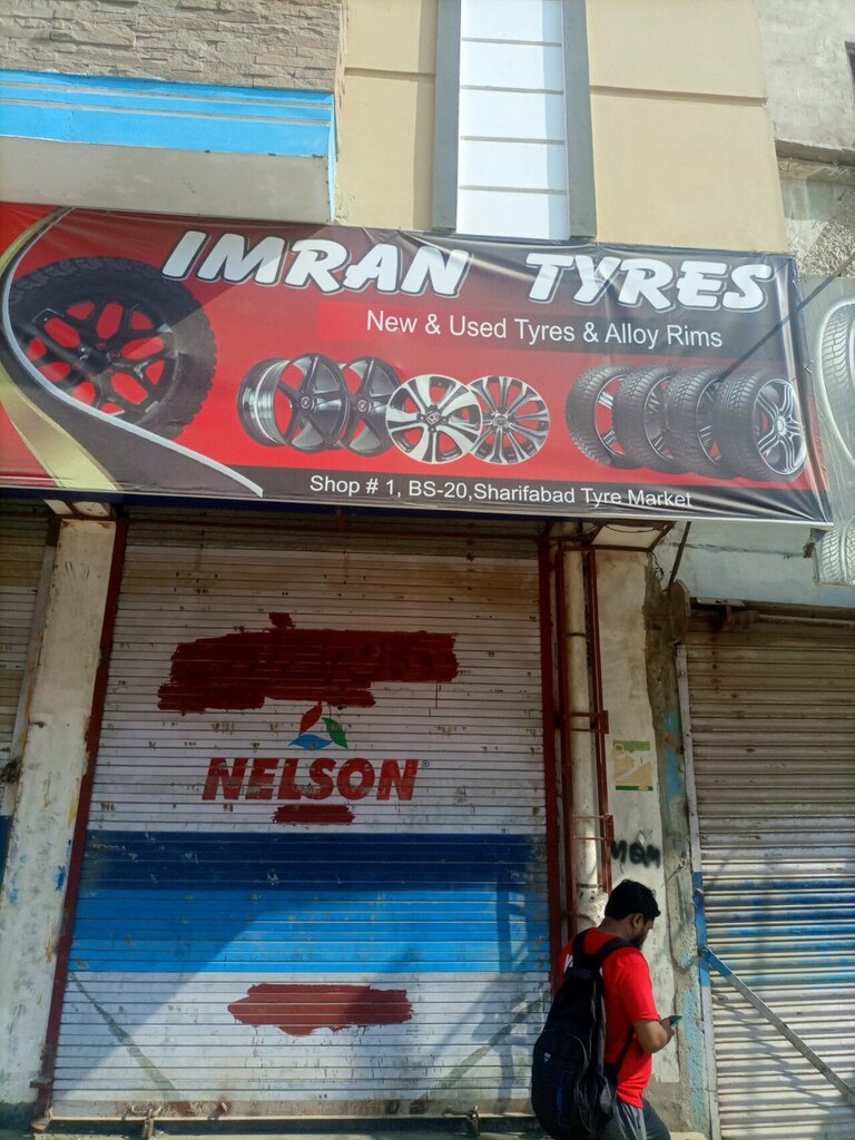Jant ve lastikçiler Imran tyres, Karaçi, foto