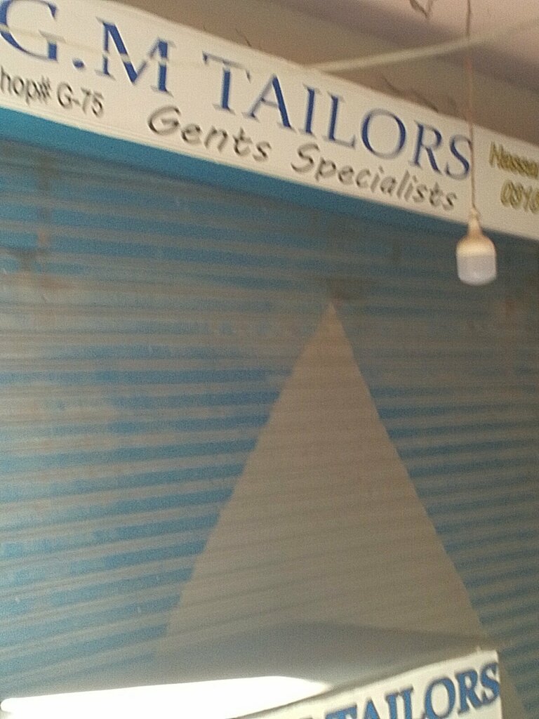 Kıyafet tamiri G. M tailor, Karaçi, foto