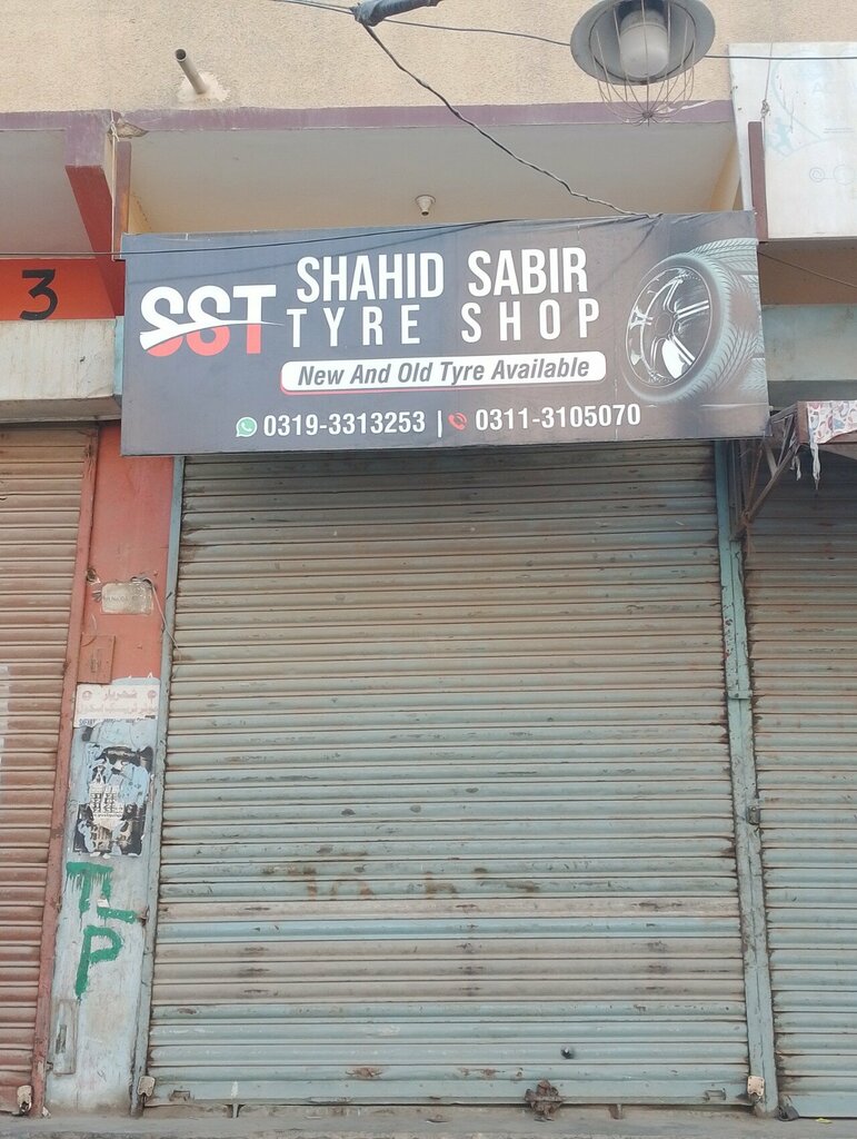Jant ve lastikçiler Shahid, Karaçi, foto