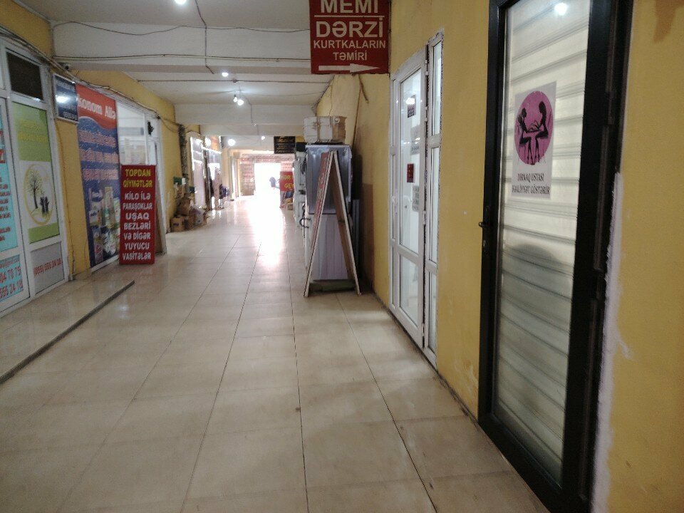Kıyafet tamiri Memi dərzi, Bakü, foto