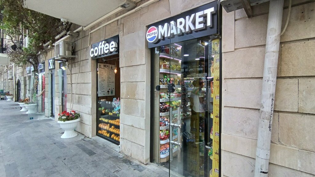 Al götür kahve Malakan park coffee and market, Bakü, foto