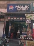 Malik pan shop (Iqbal Ave Housing Society Service Road No:13, Iqbal Avenue Housing Society), market  Lahor'dan