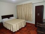 Antares Inn (Distrital Comas, Huaquillay, Avenida Tupac Amaru, 1693), otel  Lima Bölgesi'nden