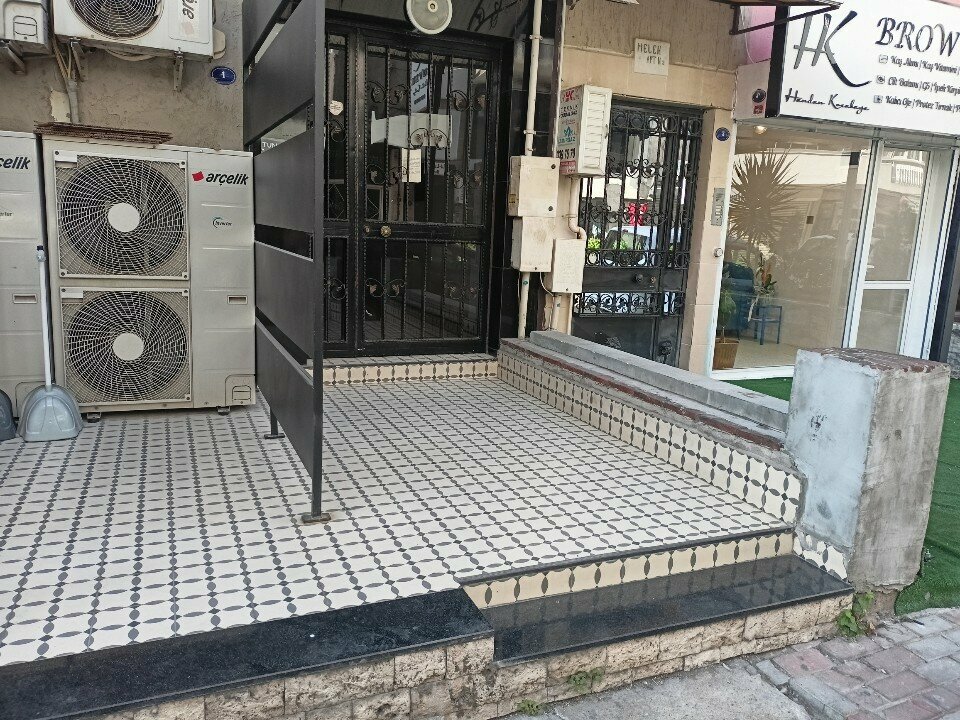 Özel ağız ve diş sağlığı klinikleri ve muayenehaneleri Diş Hekimi Tunç Özay, İzmir, foto