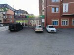 Оптовик (ulitsa Zoi Kosmodemyanskoy No:54К), market  Makhachkala'dan