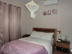 Uni Apartments (Kaleya Road No:5561), otel  Lusaka'dan