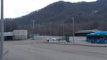КПП (Krasnodar Territory, Sochi Resort City Urban District, Esto-Sadok Village, Omelovaya Street), geçiş noktaları, güvenlik kontrol alanı  Soçi'den