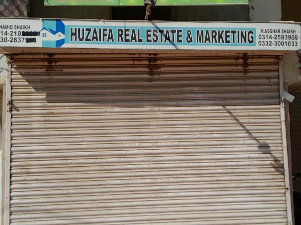 Emlak ofisi Huzaifa real state, Karaçi, foto