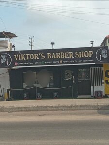 Barbearia (Luanda, Rua dos Generais), berberler  Loanda'dan