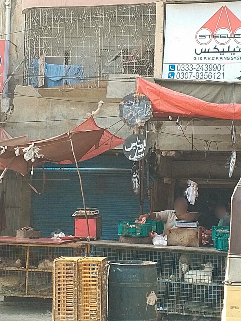 Market Shahbaz Chicken Centre, Karaçi, foto