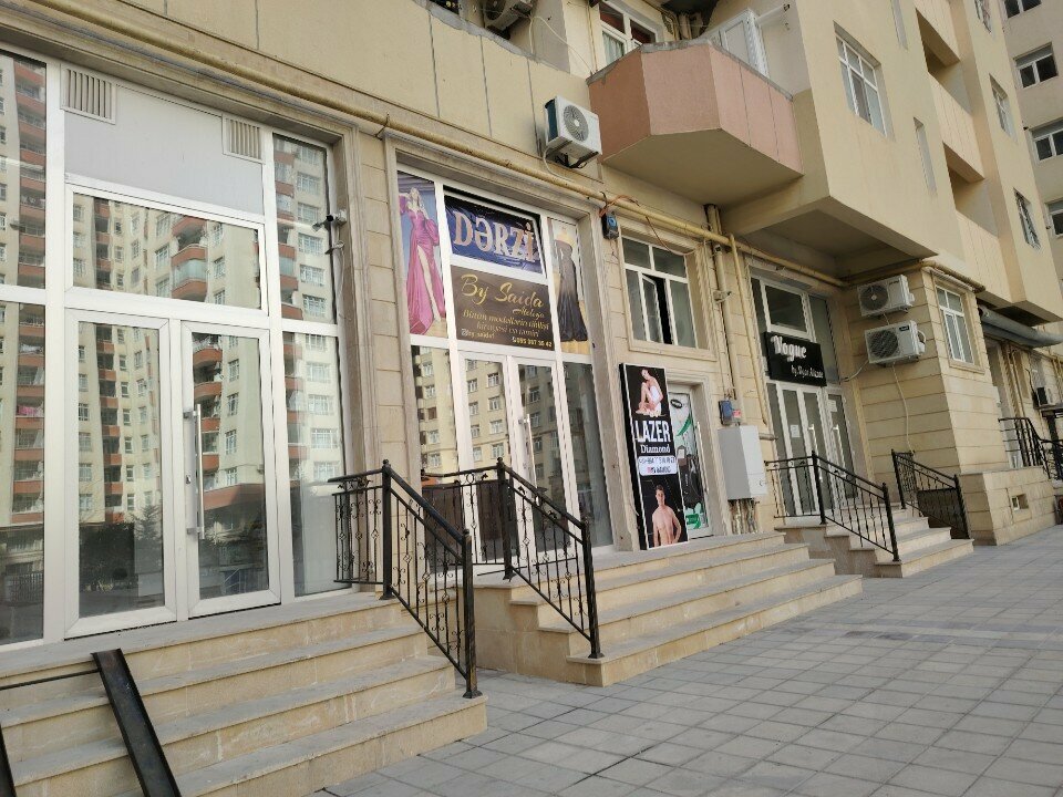 Kıyafet tamiri Dərzi, Bakü, foto