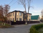 Dom u monastyrya (Mezhdunarodnaya Street No:14), otel  Pechory'den