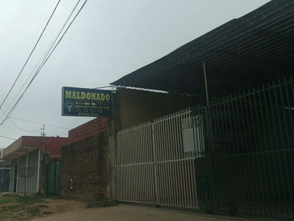 Express yağ değişim noktası Estación de servicio Maldonado, Santa‑Krus, foto