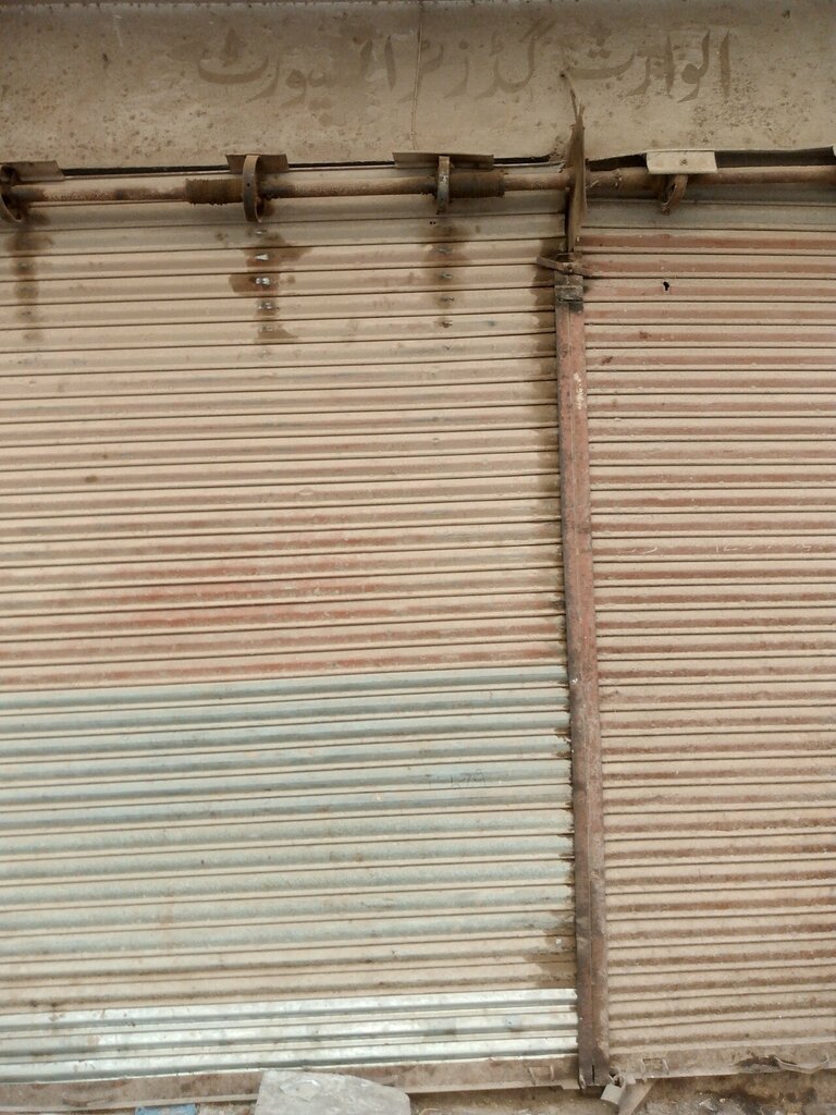 Otopark ve tamirhaneler Abrar, Karaçi, foto