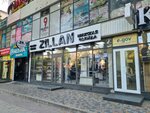 Zilan (Baýyrjan Momyshuly dańǵyly No:23), giyim mağazası  Çimkent'ten (Şımkent'ten)