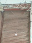 Malik interprizer (Province of Punjab, Lahore, Walled City of Lahore, Mohalla Kakezian), gazete bayi  Lahor'dan