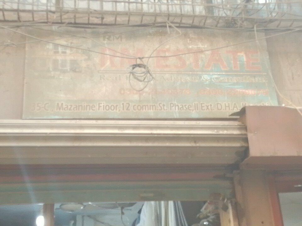 Emlak ofisi R. M estate, Karaçi, foto