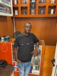 Merchant (Abidjan, La commune Adjamé, Rue F16), pazarlar ve çarşılar  Abican'dan