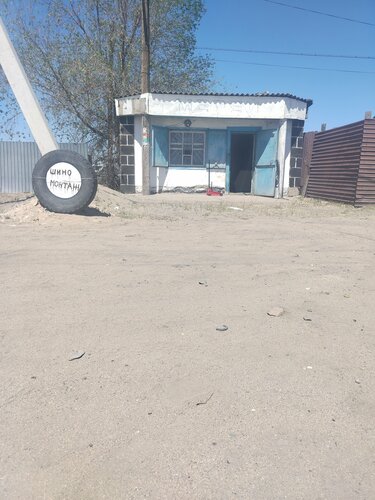 Oto lastik tamiri Shinka ot Make, Karağandı eyaleti, foto