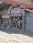 Elegance (Luanda, Rua dos Heróis), dış giyim mağazası  Loanda'dan