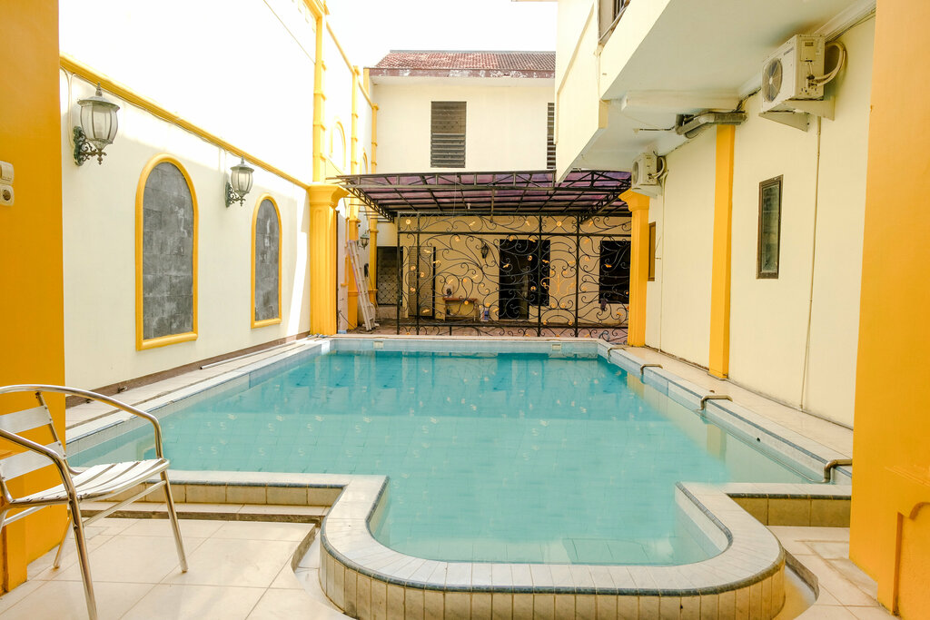 Otel Oyo 2614 Demasto Homestay, Jember, foto