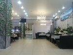 Азия Сити (Tayozhnaya Street No:9), kafe  Usinsk'ten